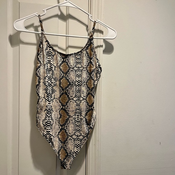 Hera Collection | Tops | Nwot Celebrity Fashion Croco Print Bodysuit By ...